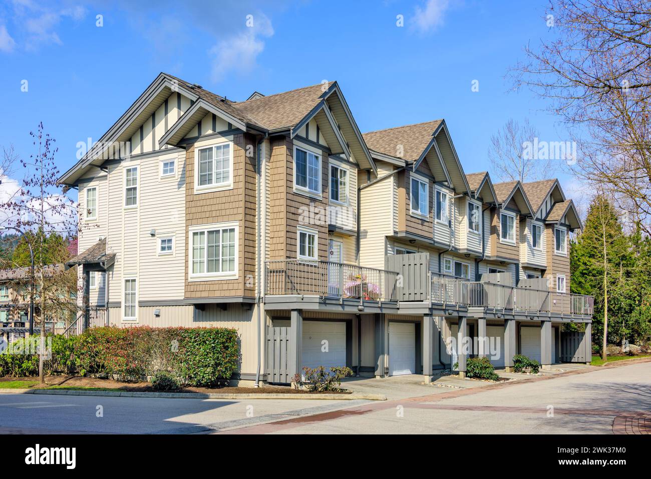 A perfect neighbourhood. New townhouses on spring season Stock Photo ...