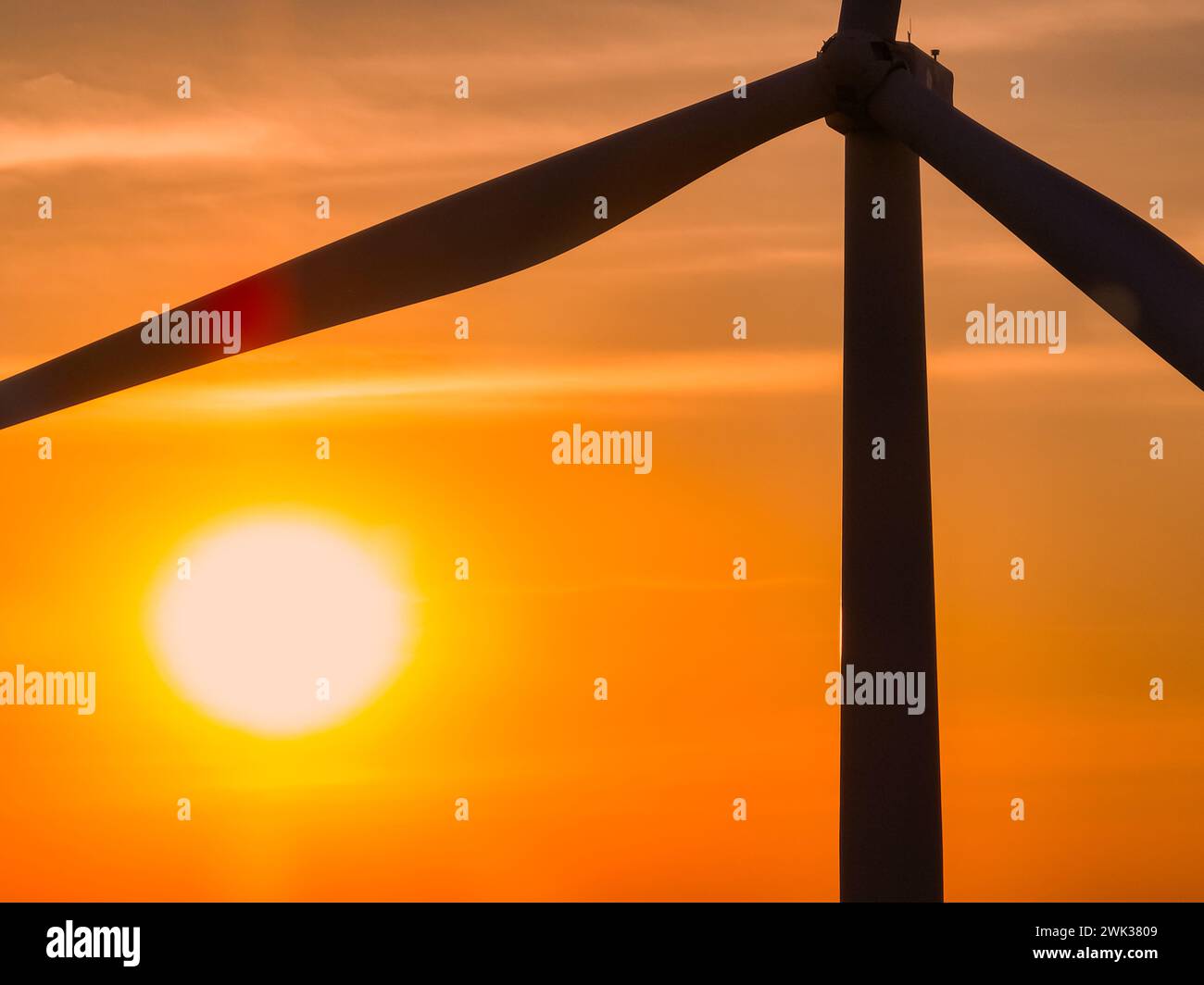 Wind farm field and sunset sky. Wind power. Sustainable, renewable ...