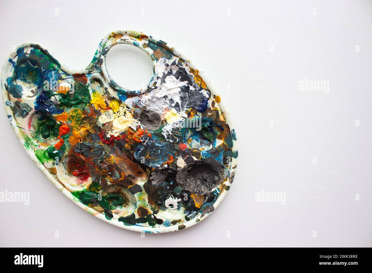 Palette with bright colours on white background. Abstract art. Paint ...