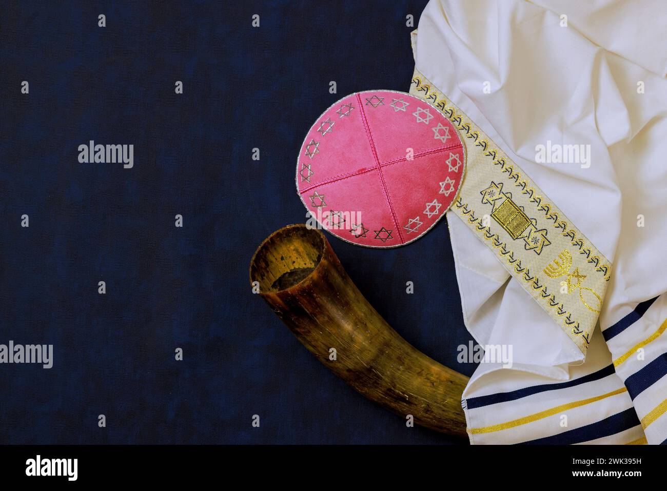 An Orthodox Jewish holiday symbol consists of prayer shawl tallit, head ...