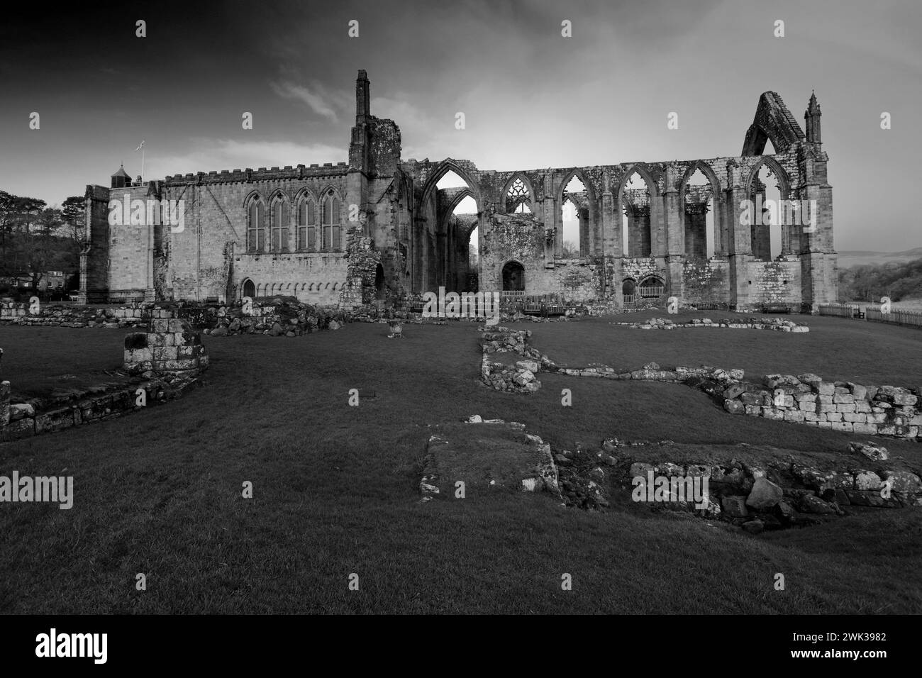 The ruins of the 12th Century Bolton Abbey Priory, river Wharfe ...