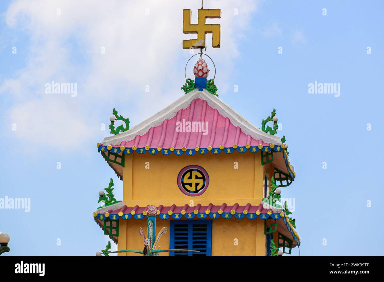 Sa Đéc, Vietnam. Feb 18, 2024: Svastika symbol cross at Cao Đài Temple ...