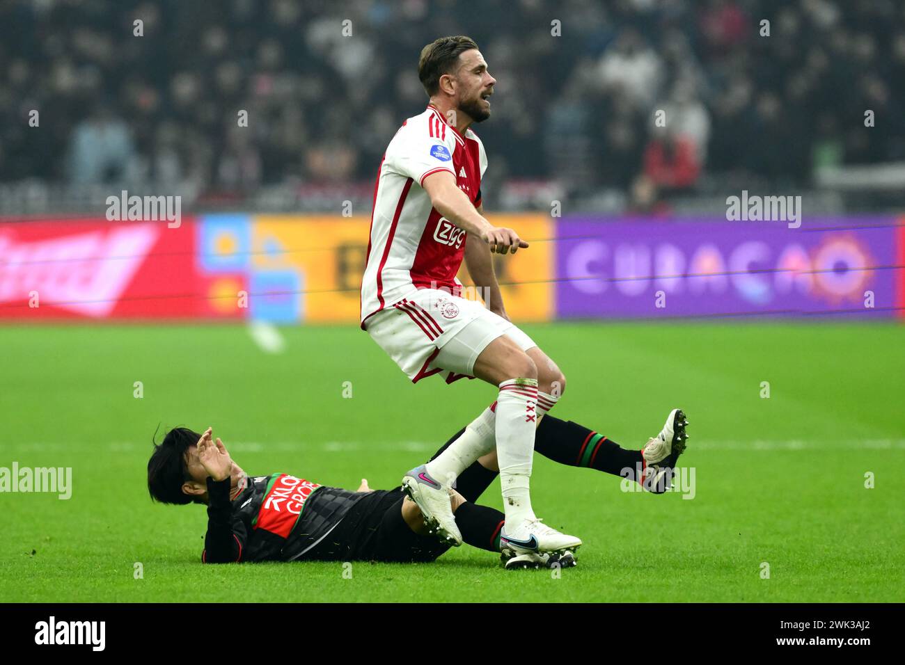 AMSTERDAM - (l-r) Kodai Sano of NEC Nijmegen, Jordan Henderson of Ajax ...