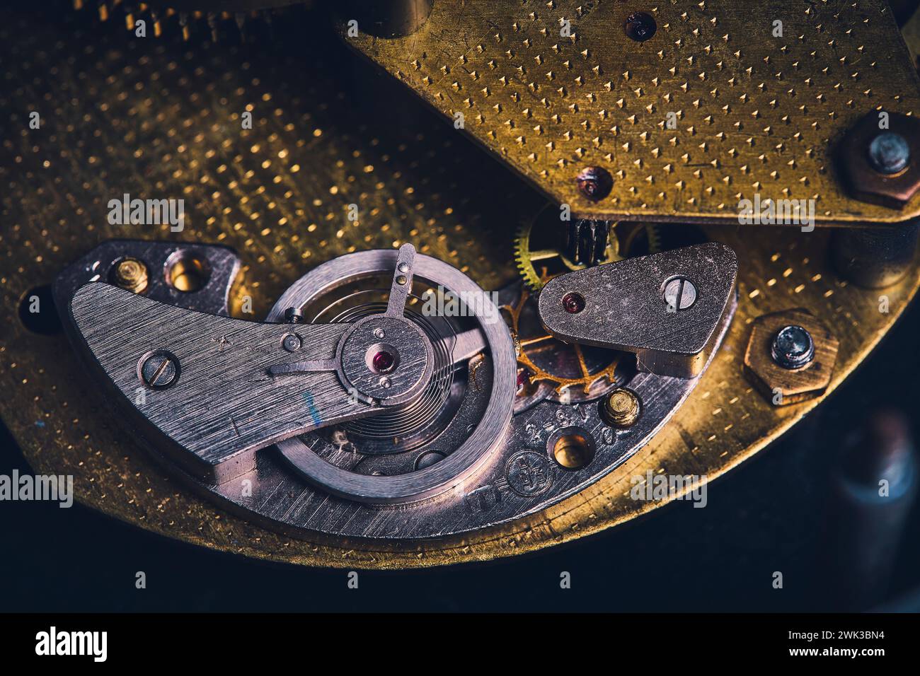 Macro view of gears in an old wall clock mechanism Stock Photo - Alamy