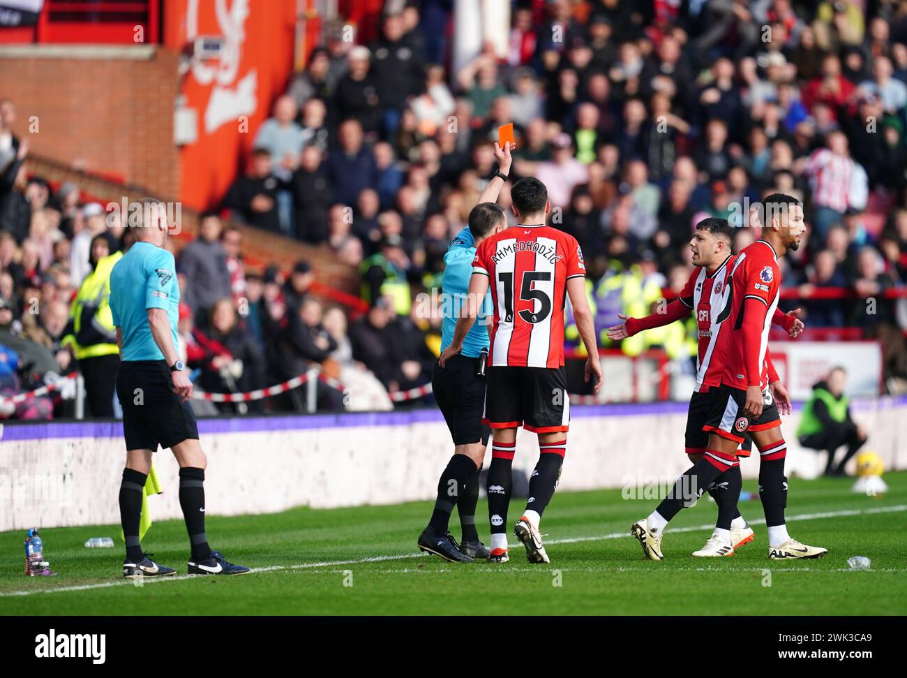 Sheffield United's Mason Holgate shown a red card by referee Stuart ...