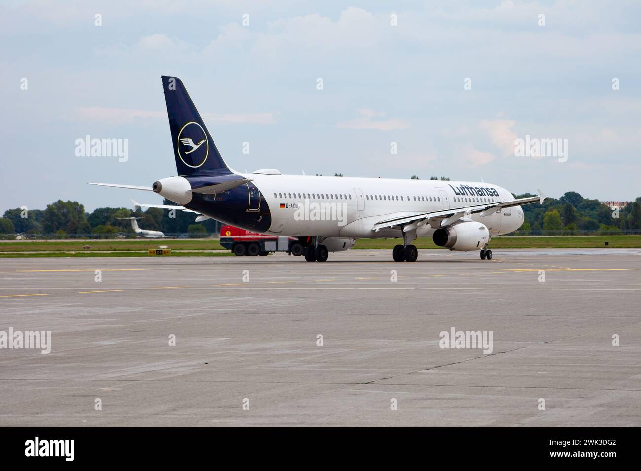 Passenger plane of the German airline Lufthansa D-AIDB. Airport apron ...