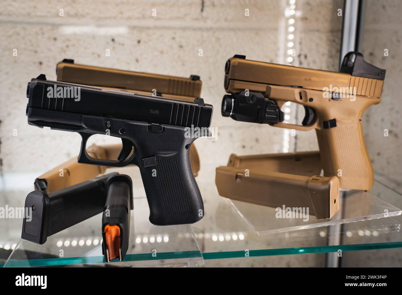 Firearms, modern pistols g19x and g43x on display in a store, close-up ...