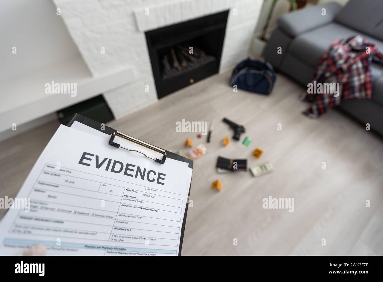 forensic 's hand in black glove writing on evidence bag and seal by red ...