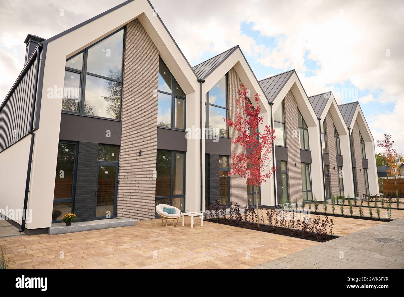 Raw of modern houses standing in suburban area Stock Photo - Alamy