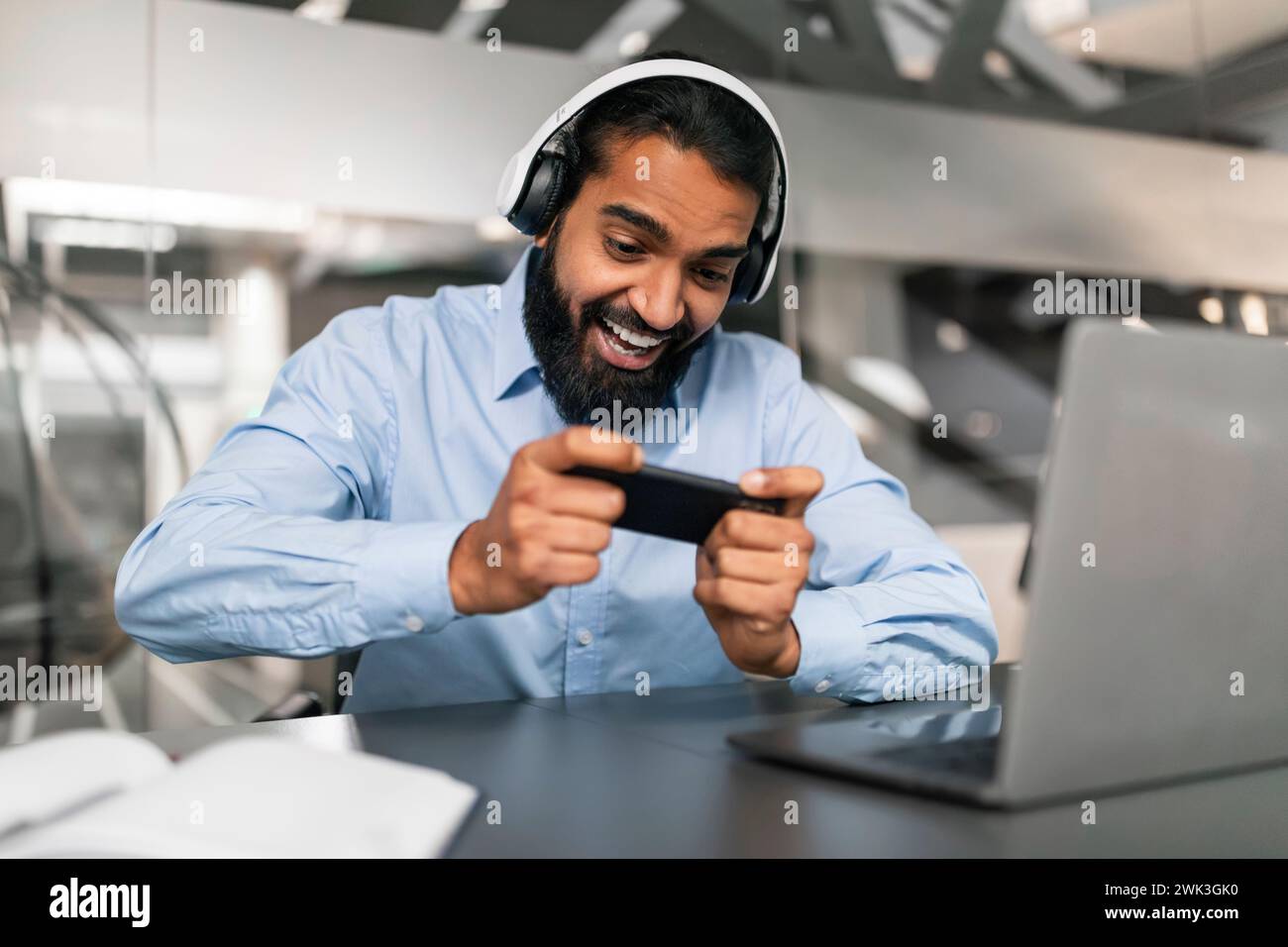 Businessman headphones in office hi-res stock photography and images ...