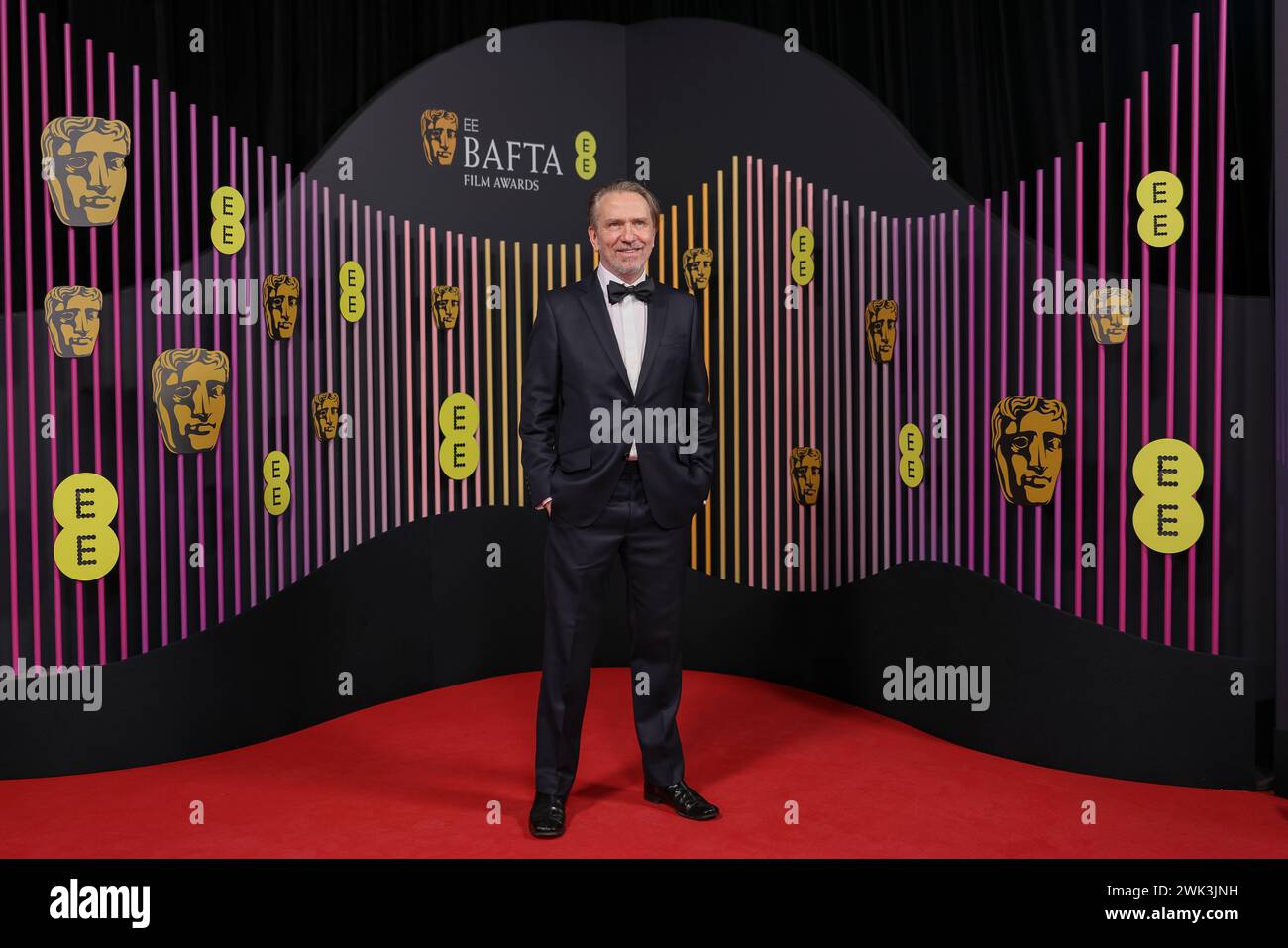 Editor Paul Watts poses for photographers upon arrival at the 77th ...