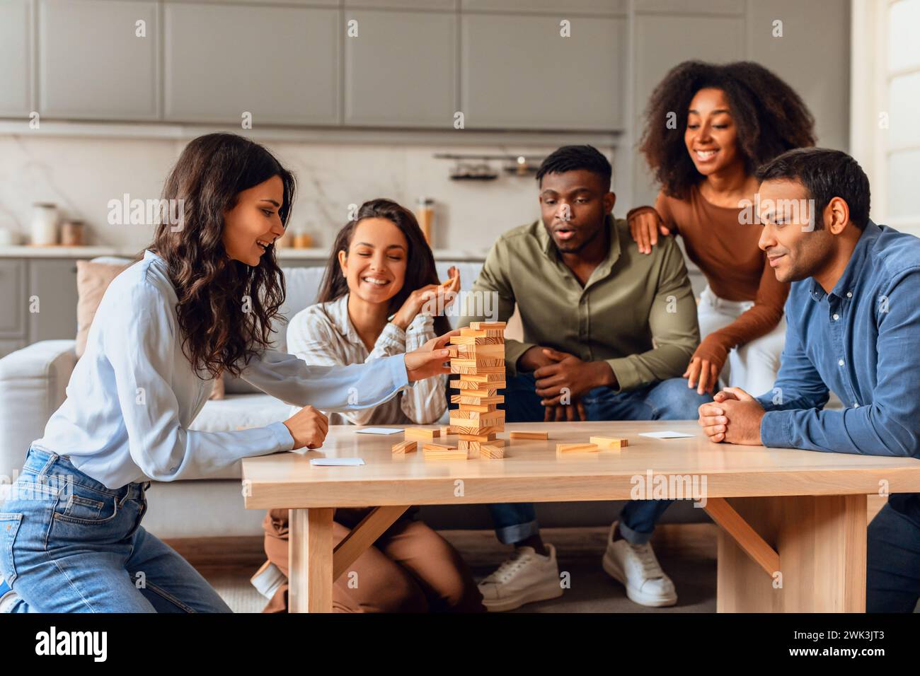 Lively gathering around table hi-res stock photography and images - Alamy