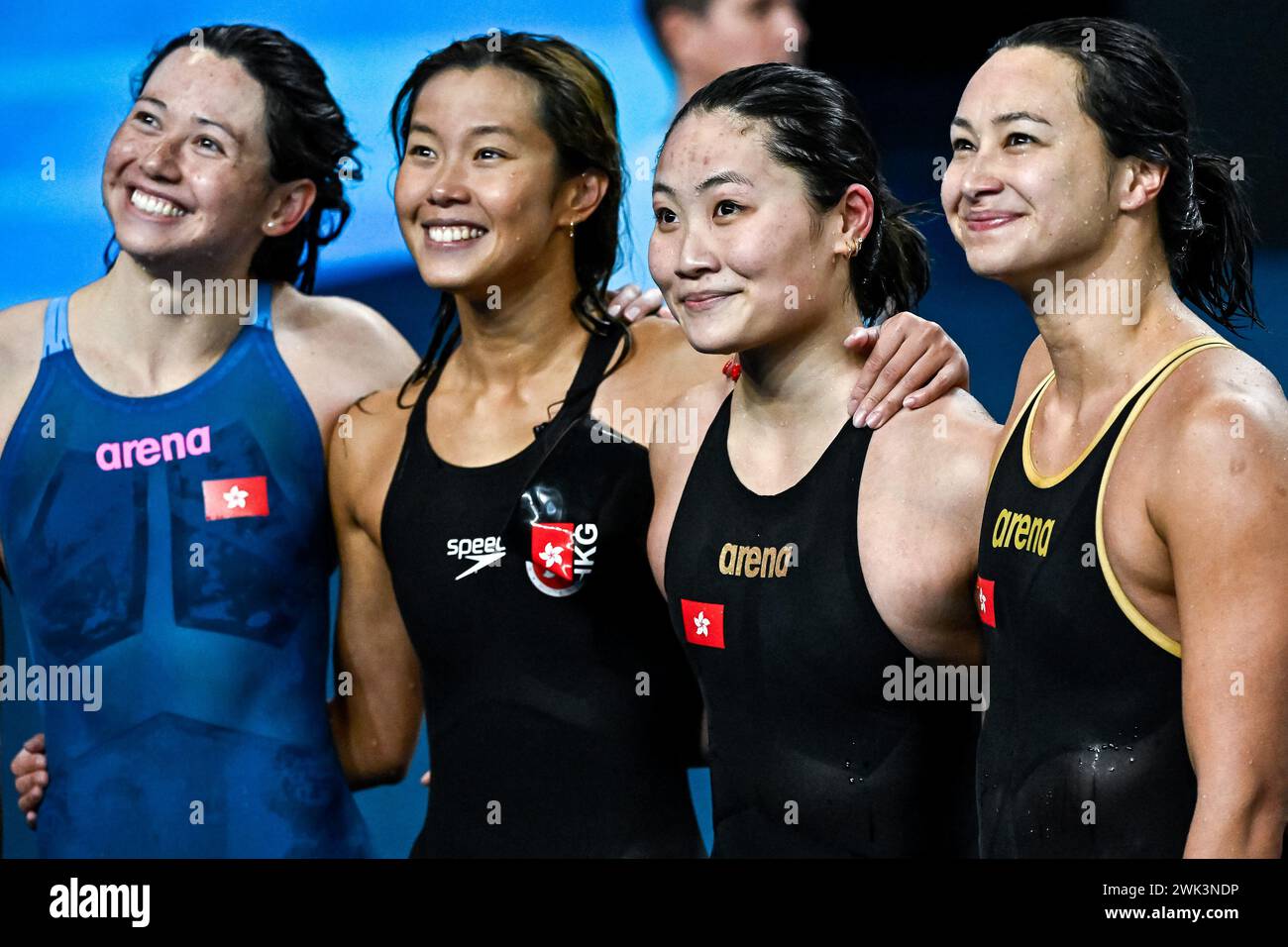 Doha, Qatar. 18th Feb, 2024. Athletes of team Hong Kong react after ...