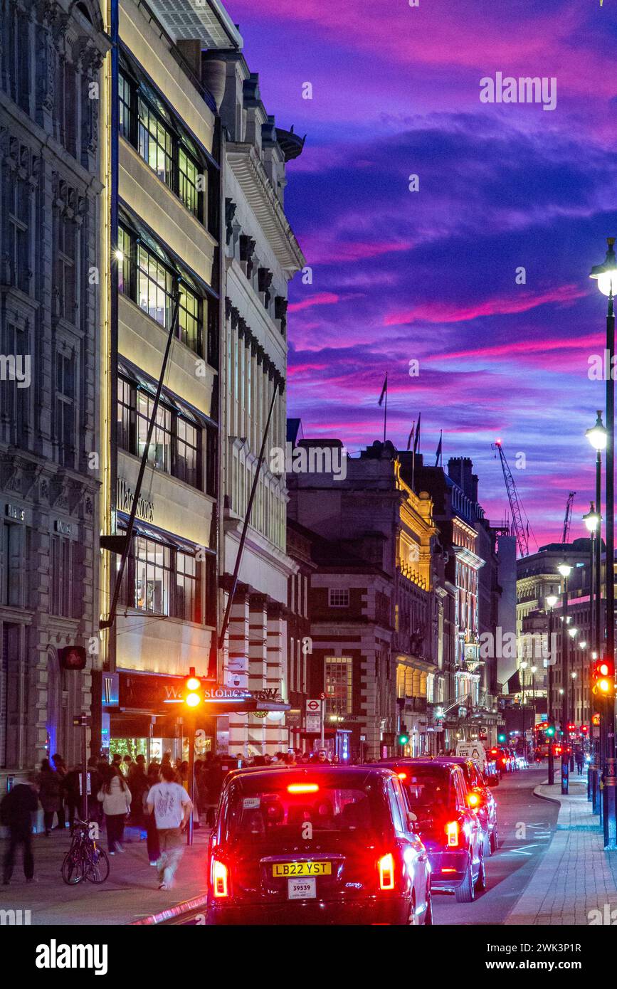 A traffic jam on Piccadilly in Central London with a dramatic sunse ...