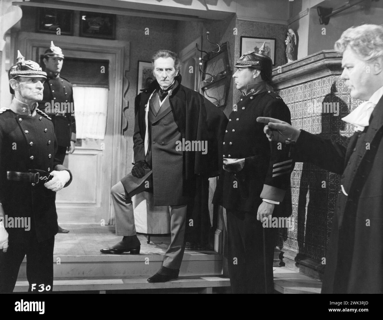 PETER MADDEN, PETER CUSHING and THORLEY WALTERS in a scene from ...