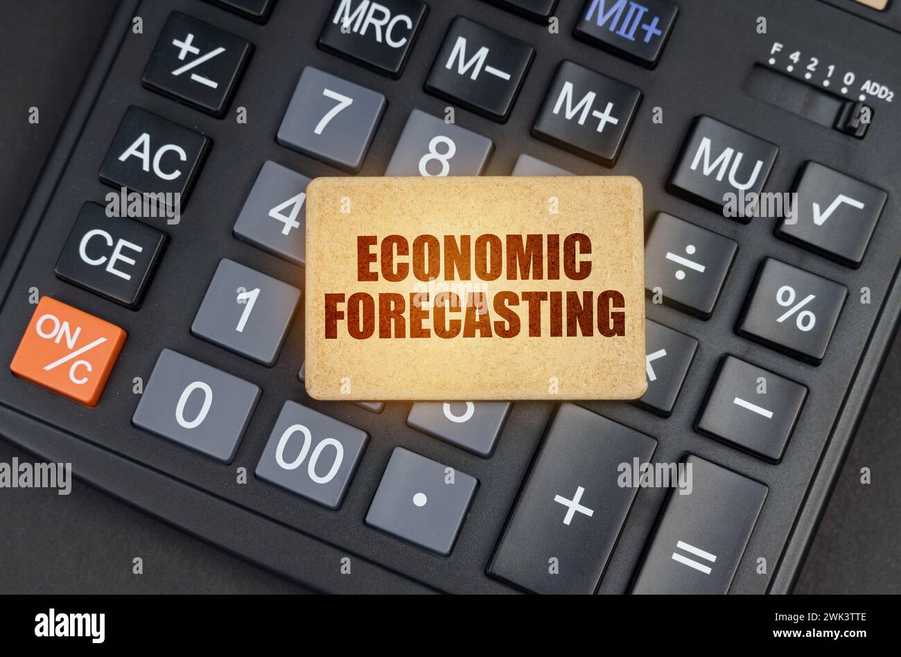 Financial concept. There is a sign on the calculator that says ...