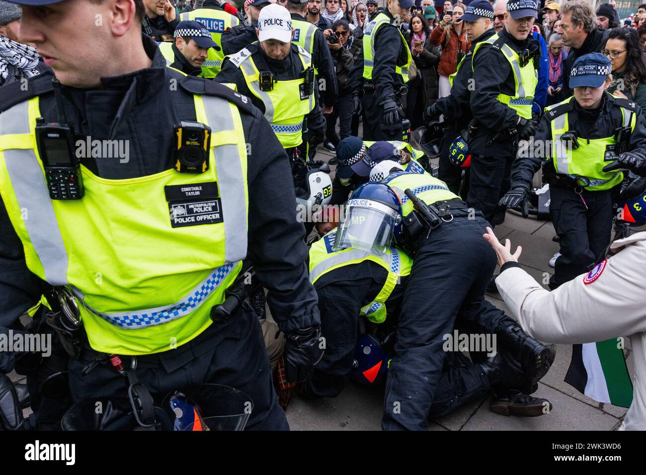 London, UK. 17th February, 2024. Metropolitan Police officers arrest ...