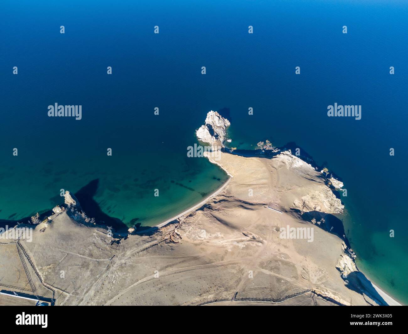 Sarayskiy beach. Shamanka Rock. Lake Baikal at Olkhon Island. the ...