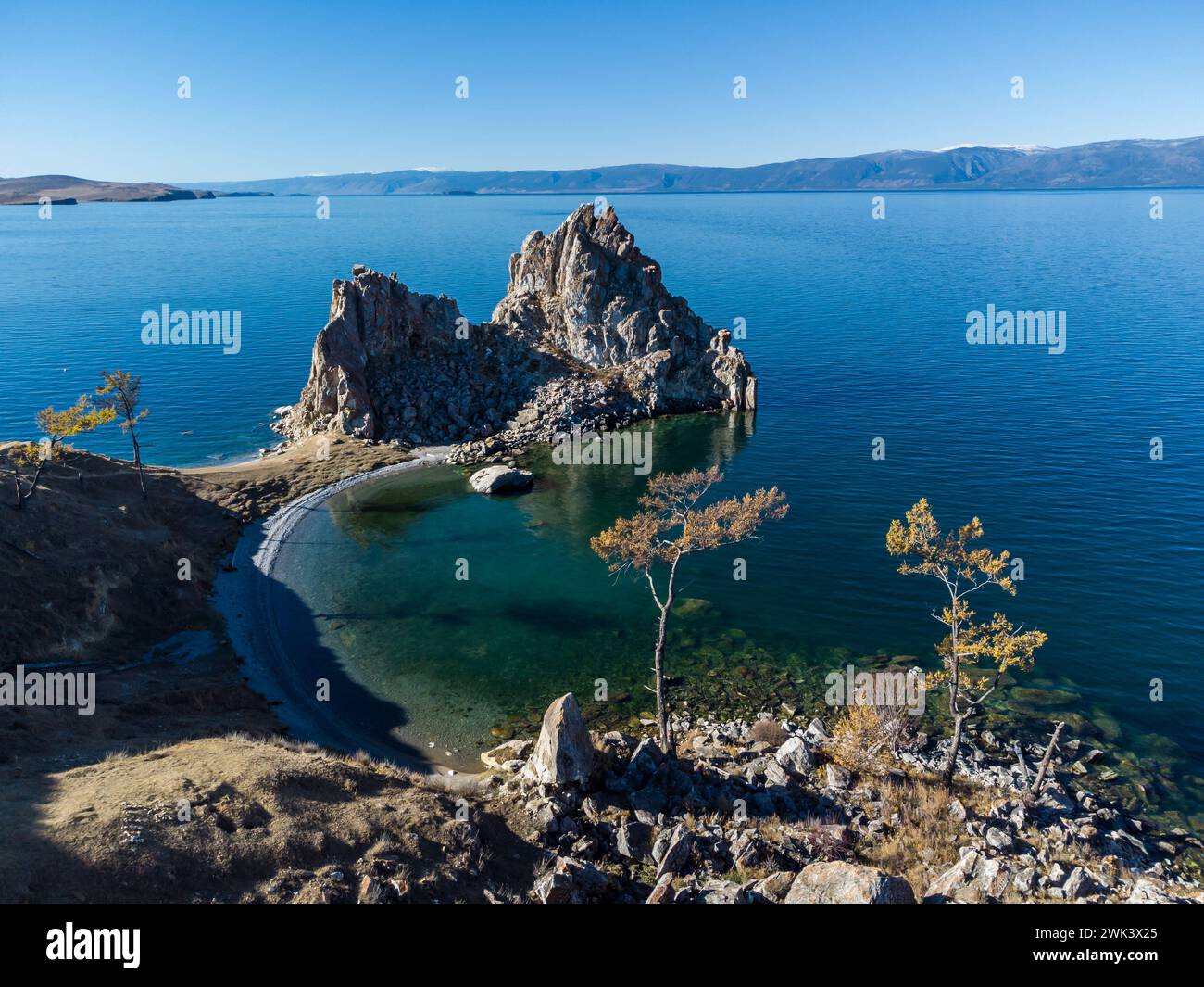Sarayskiy beach. Shamanka Rock. Lake Baikal at Olkhon Island. the ...