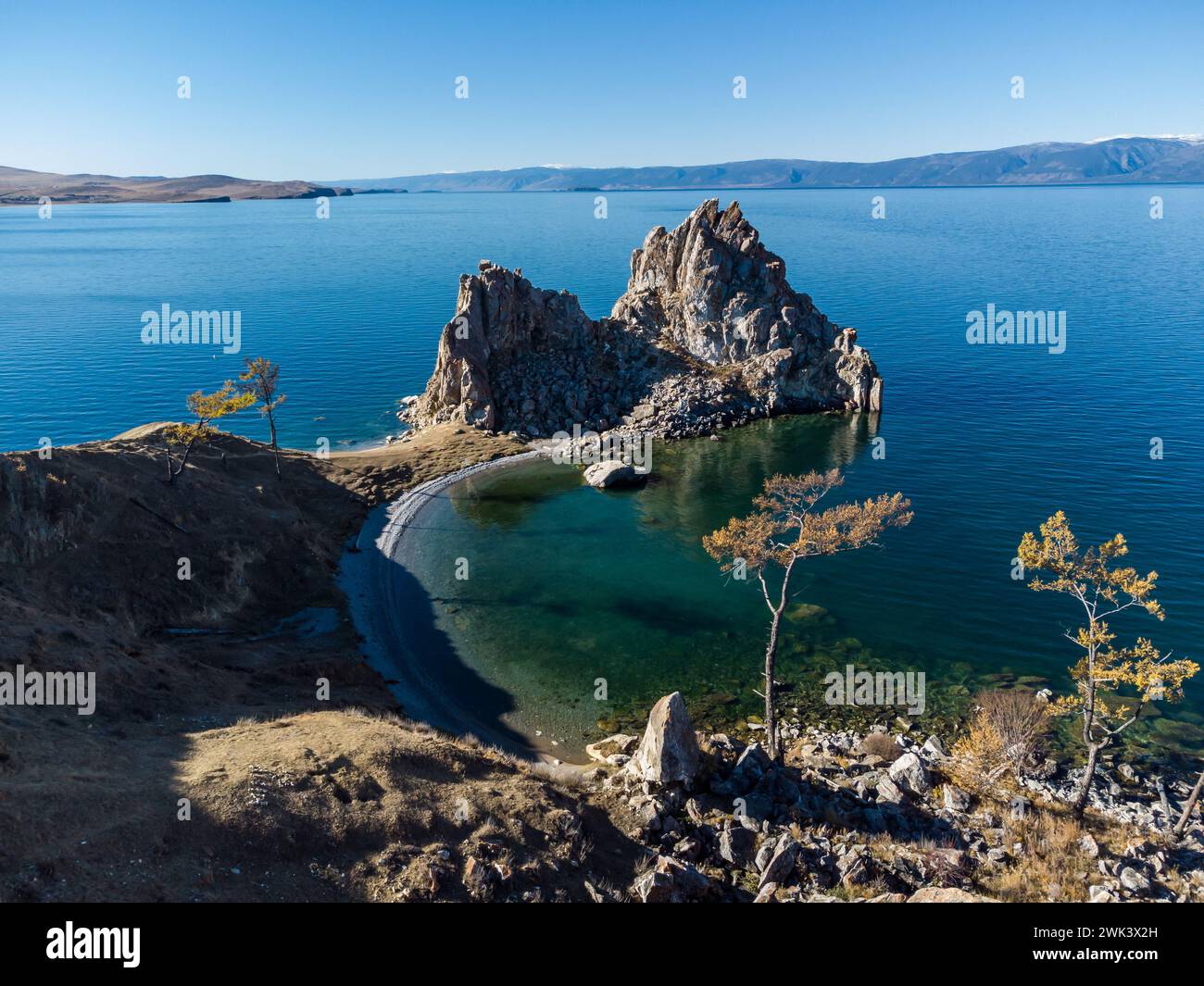 Sarayskiy beach. Shamanka Rock. Lake Baikal at Olkhon Island. the ...