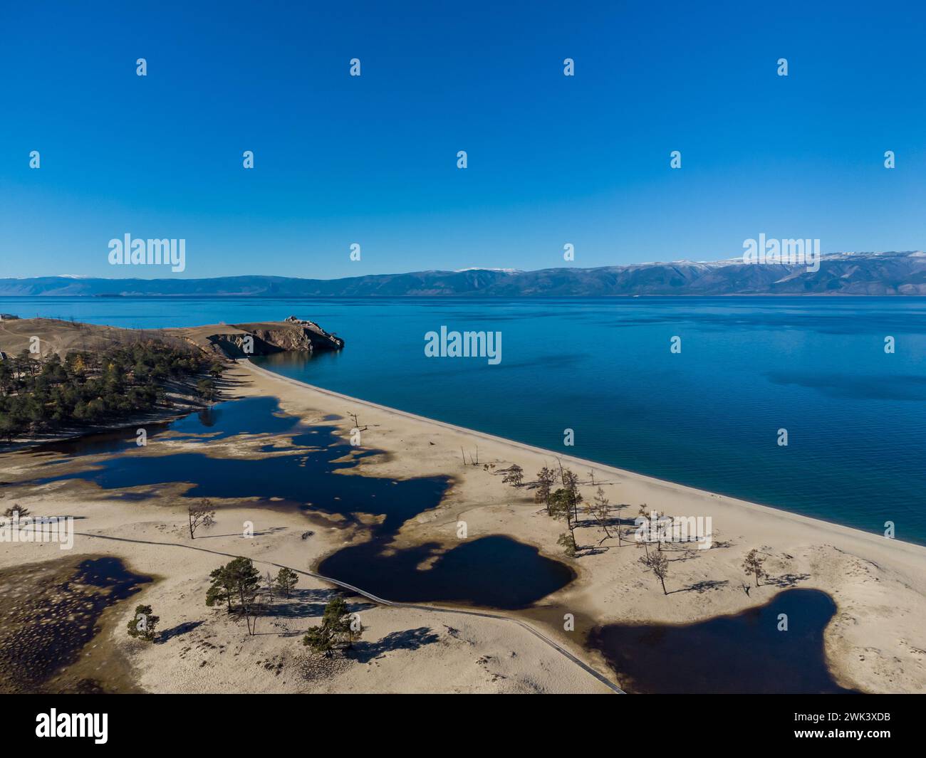 Sarayskiy beach. Shamanka Rock. Lake Baikal at Olkhon Island. the ...