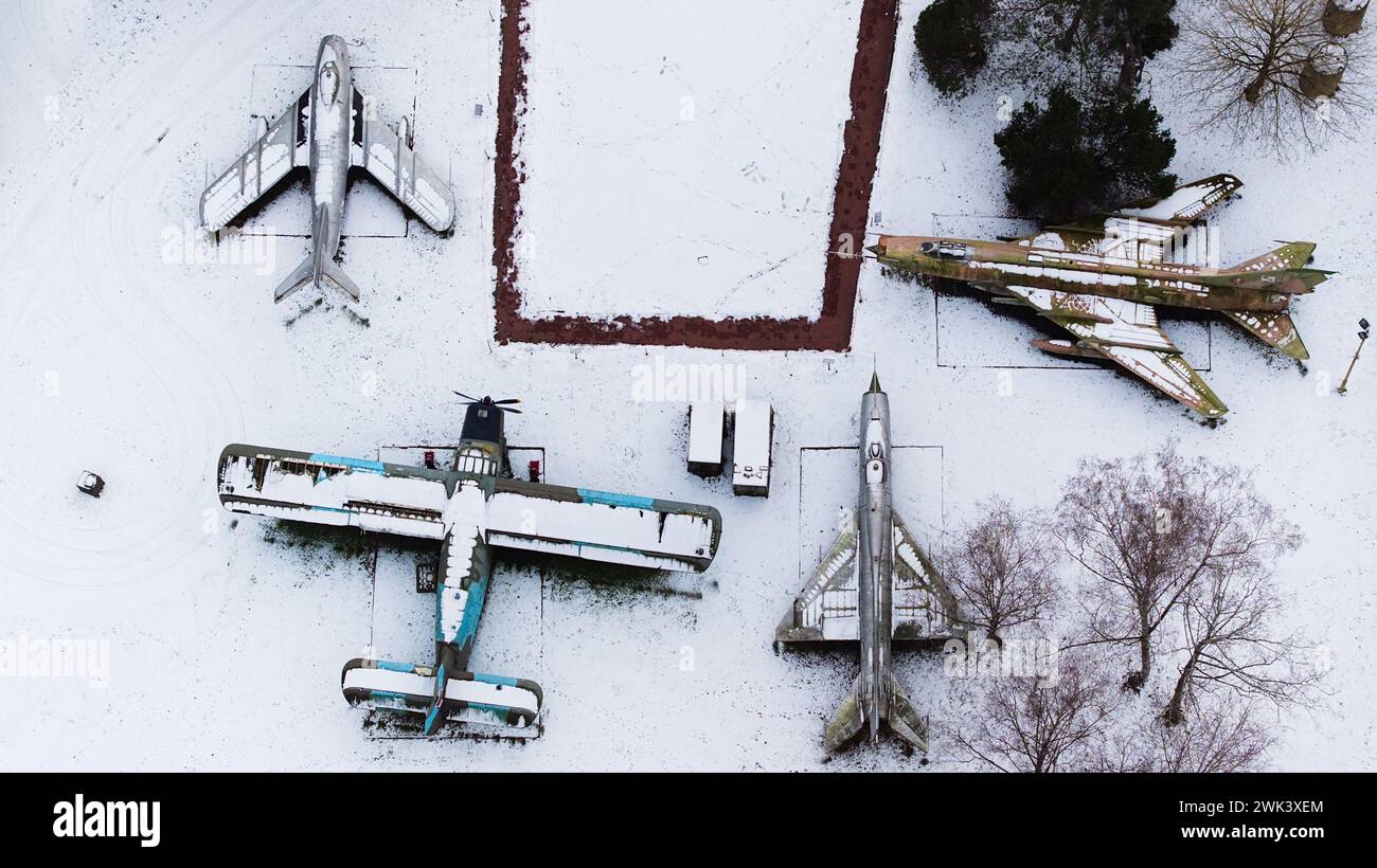 Aerial view of snow-clad tanks, artillery, armored vehicles, military ...