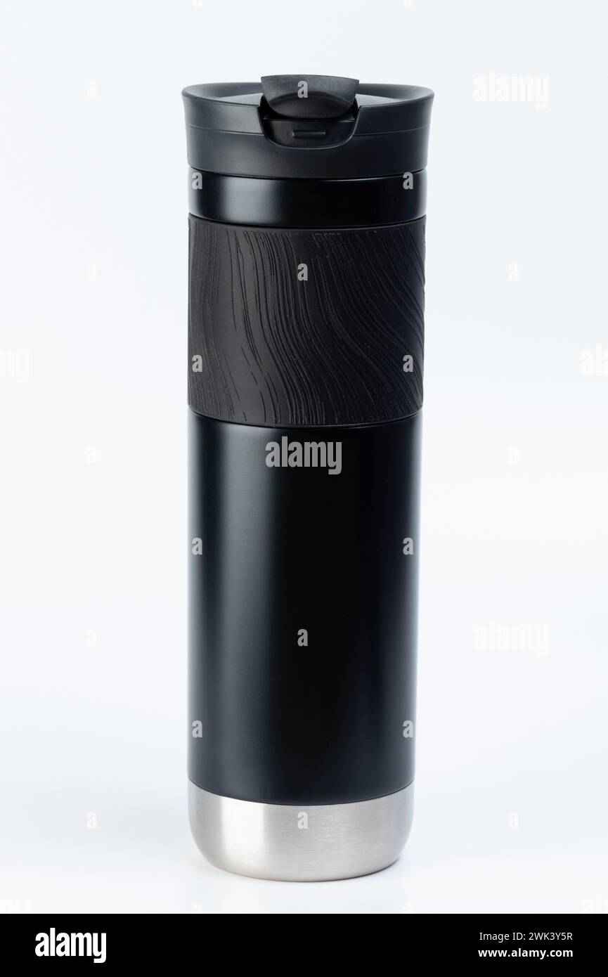 Open black flask with metal texture isolated on white studio background ...