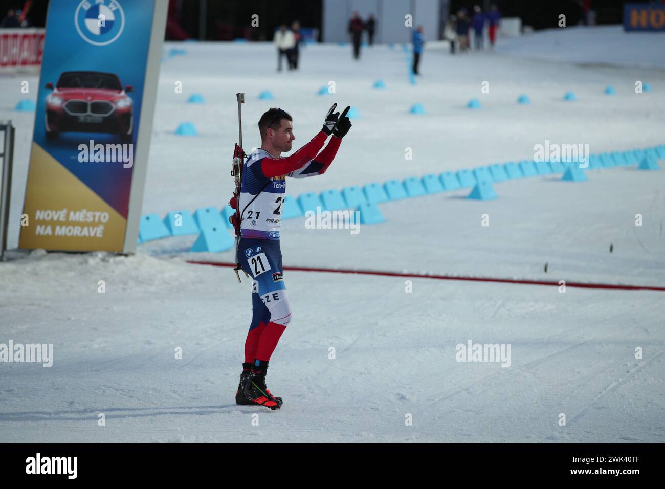 Czech Michal Krcmar greets fans after the Men's mass start race - 15 km during the Biathlon ...
