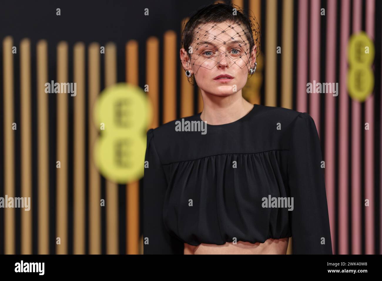 Emma Corrin poses for photographers upon arrival at the 77th British ...