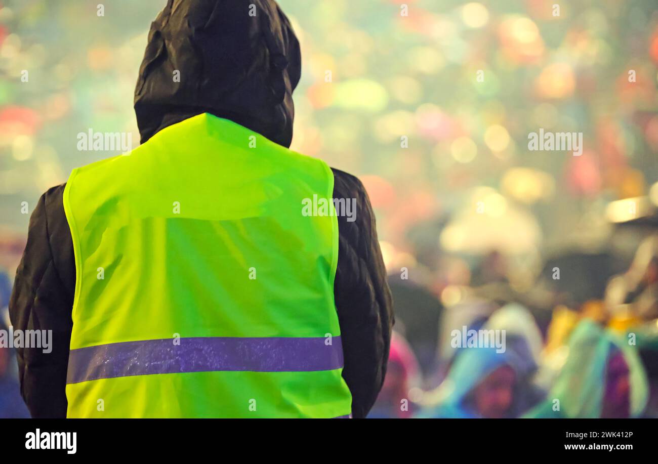 guard with the reflective vest during the event at the stadium while it ...
