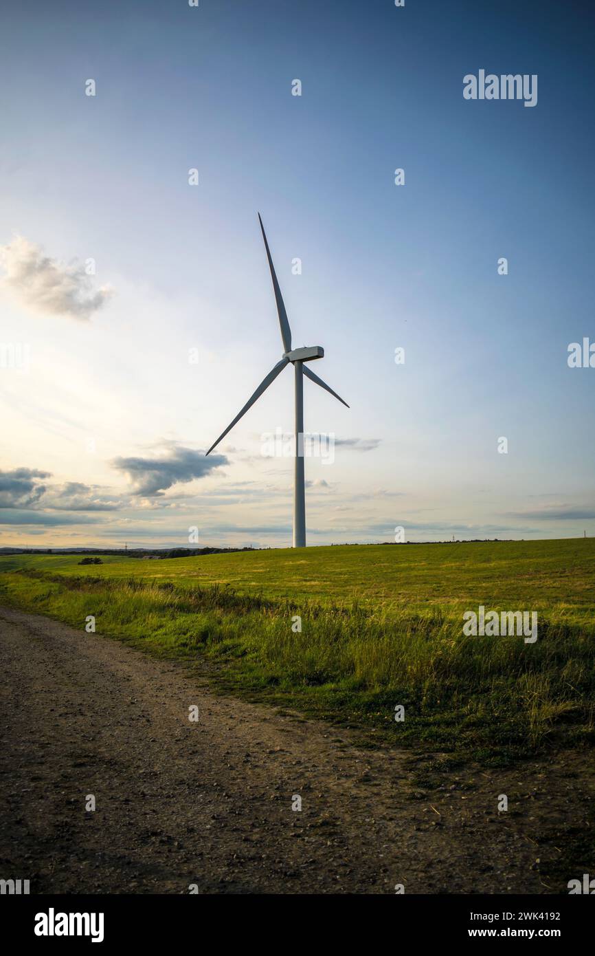 A lone wind turbine stands proud in its field Stock Photo - Alamy