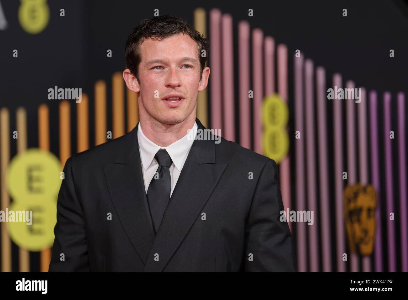 Callum Turner poses for photographers upon arrival at the 77th British ...