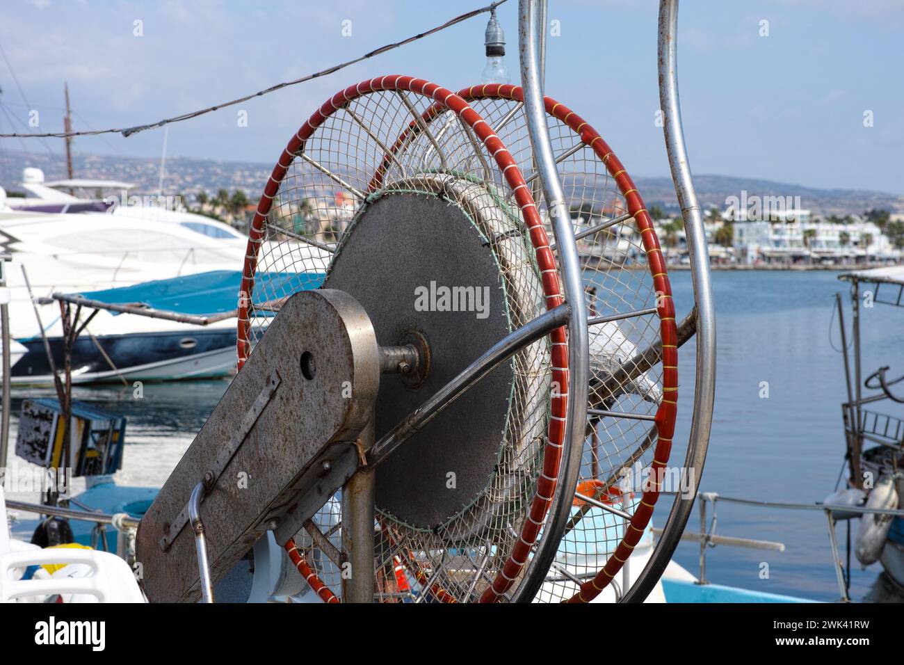 A close-up shot of a fishing boat net winch on a boat which is standing ...