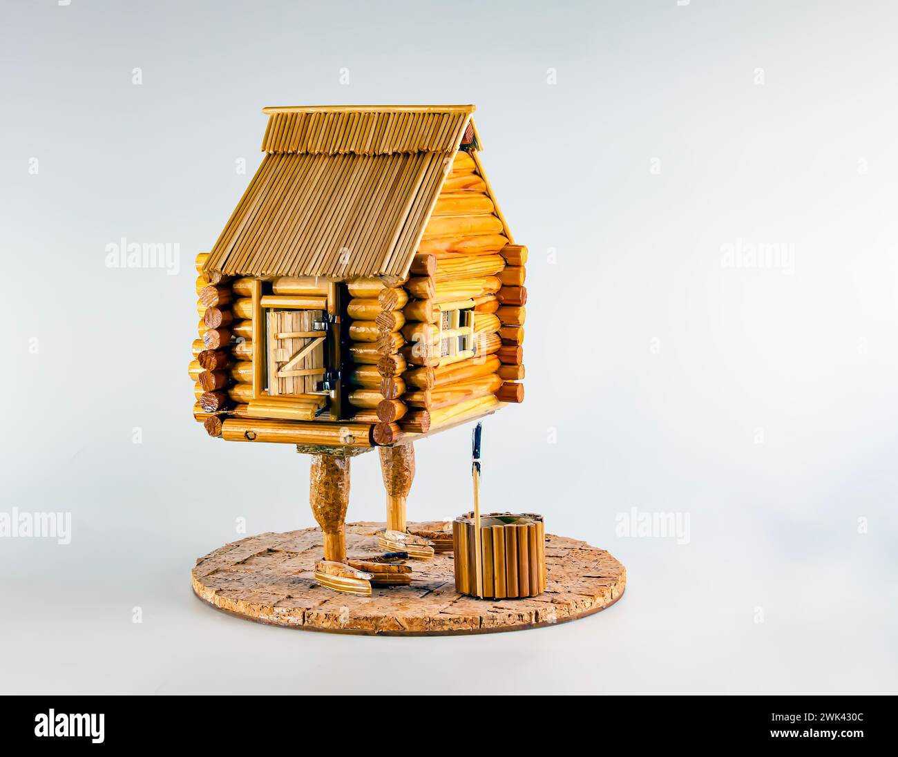 A figurine of a wooden house on chicken legs. Baba Yaga's house ...