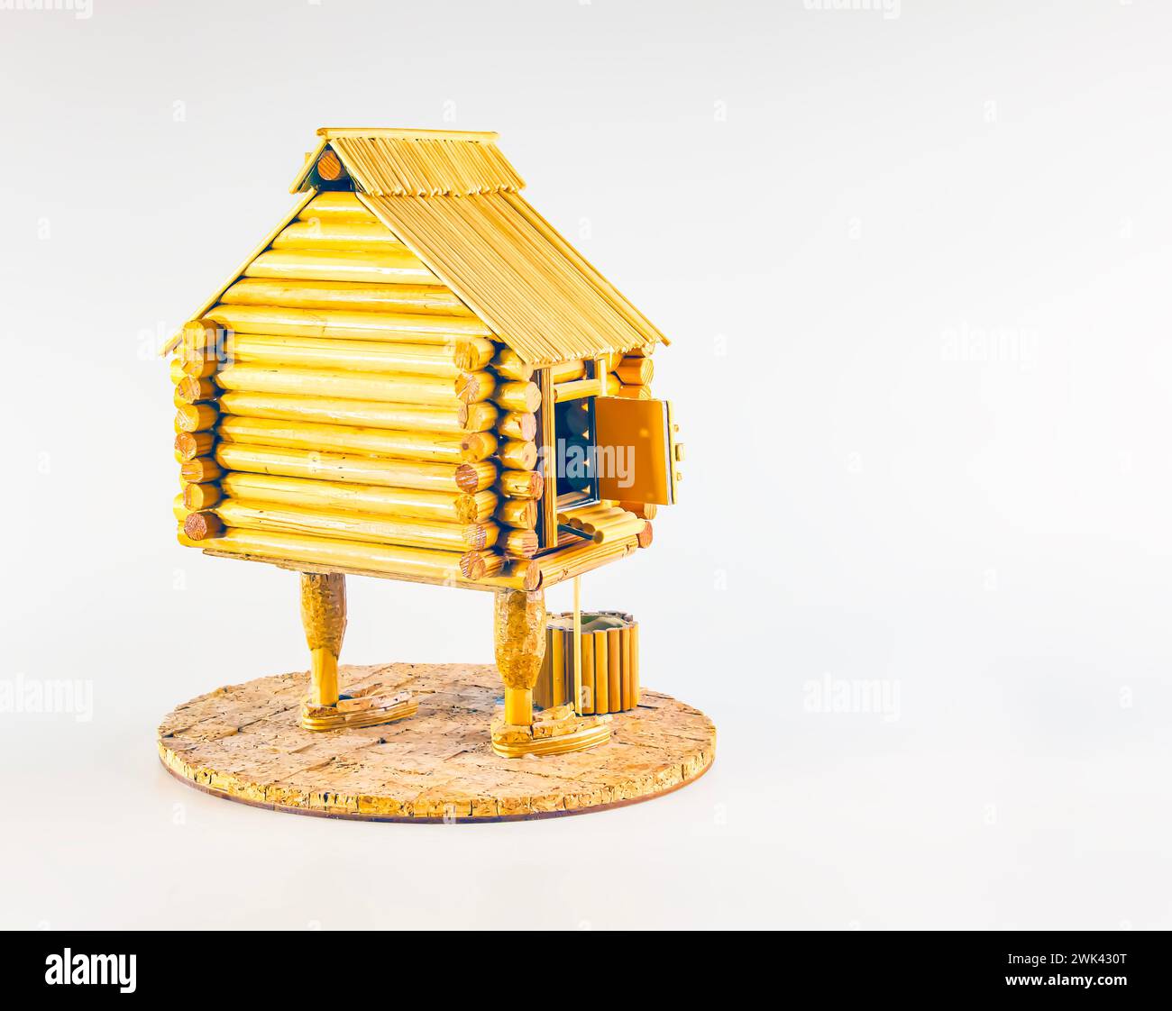A figurine of a wooden house on chicken legs. Baba Yaga's house ...