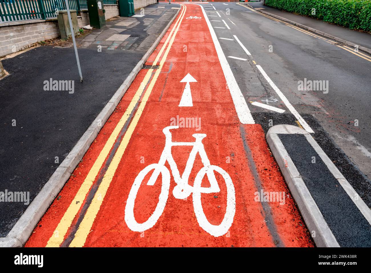 New cycling path made of red asphalt as part of 10 minutes city ...