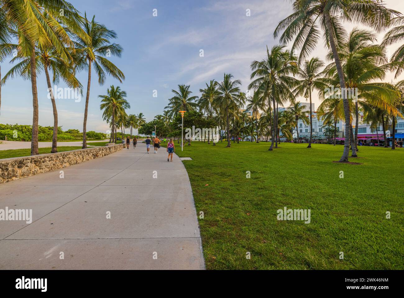 Beautiful view of Ocean Drive in Miami Beach park area with people ...