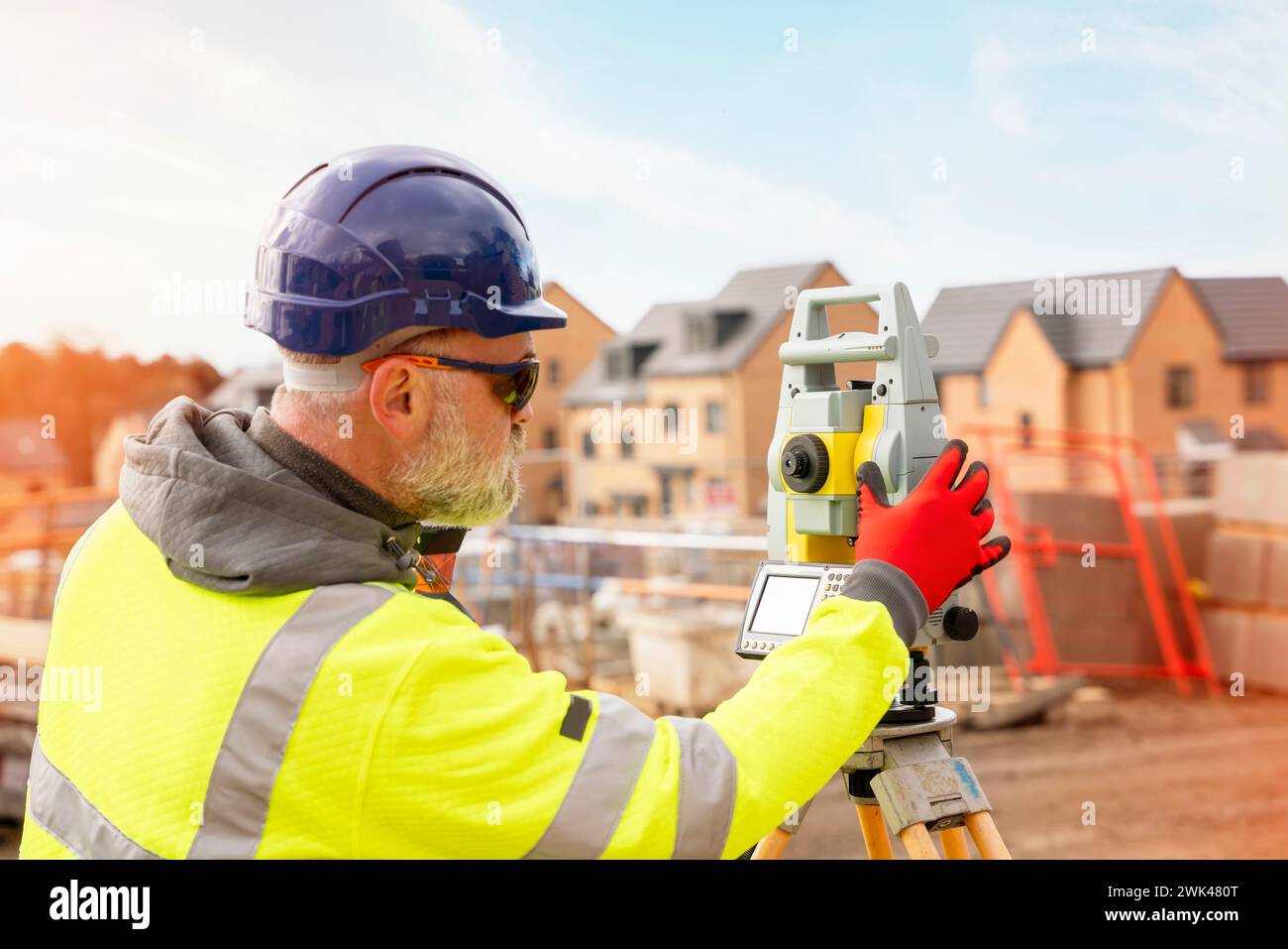 Surveyor builder site engineer with theodolite total station at ...