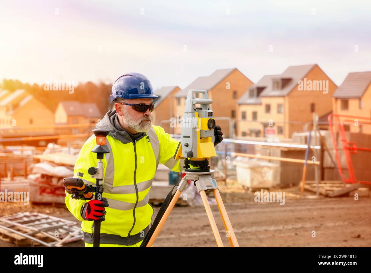 Surveyor builder site engineer with theodolite total station at ...