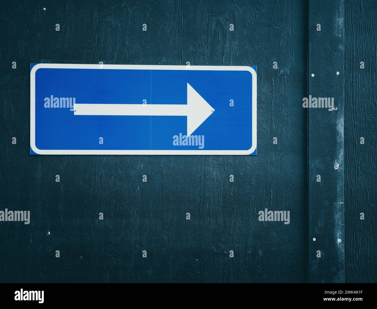 Signboard mounted wall arrow symbol hi-res stock photography and images ...