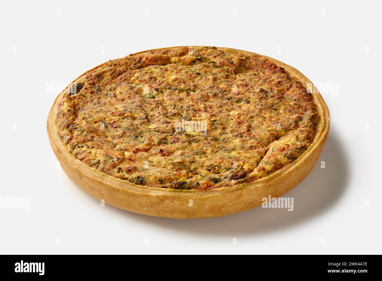 Traditional French savory cheese and spinach quiche on white Stock ...
