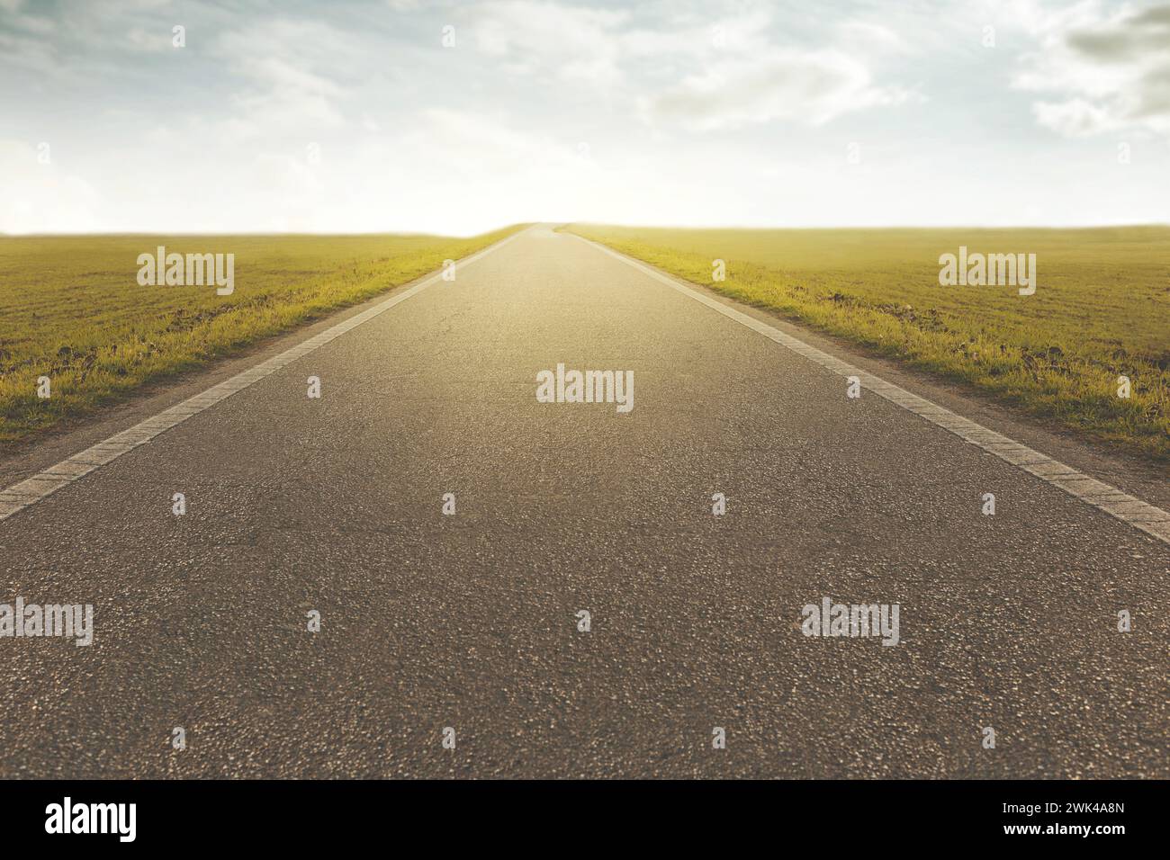 surreal road illuminated by the sun indicates the way to the infinite ...