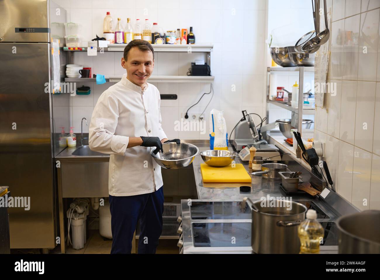 Male chef uses ingredients hi-res stock photography and images - Alamy