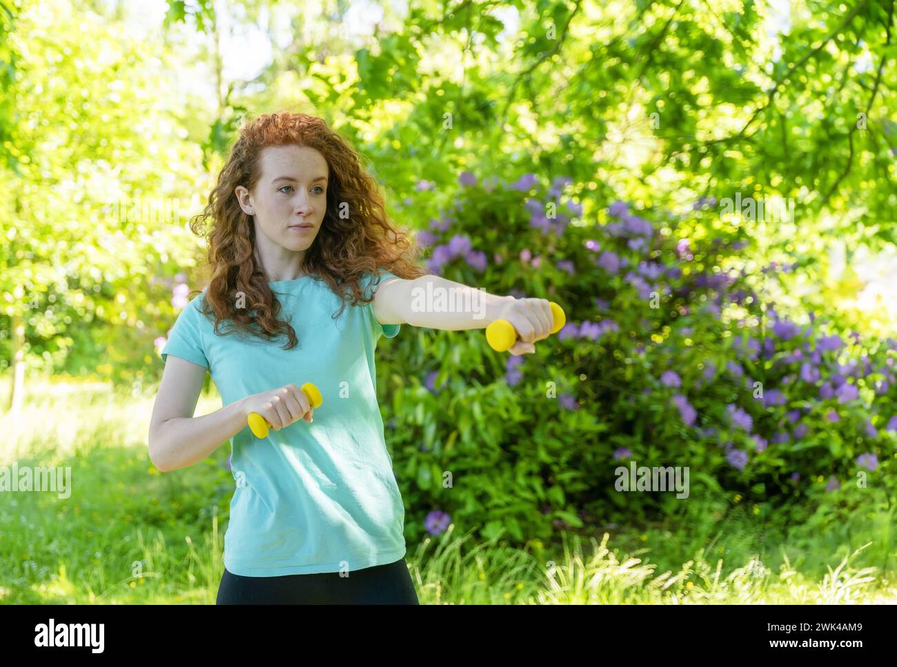 The happy person doing yoga and exercise in nature for mental health ...