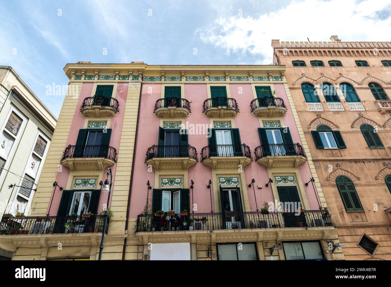 Facade of old classic buildings in the old town of Palermo, Sicily ...
