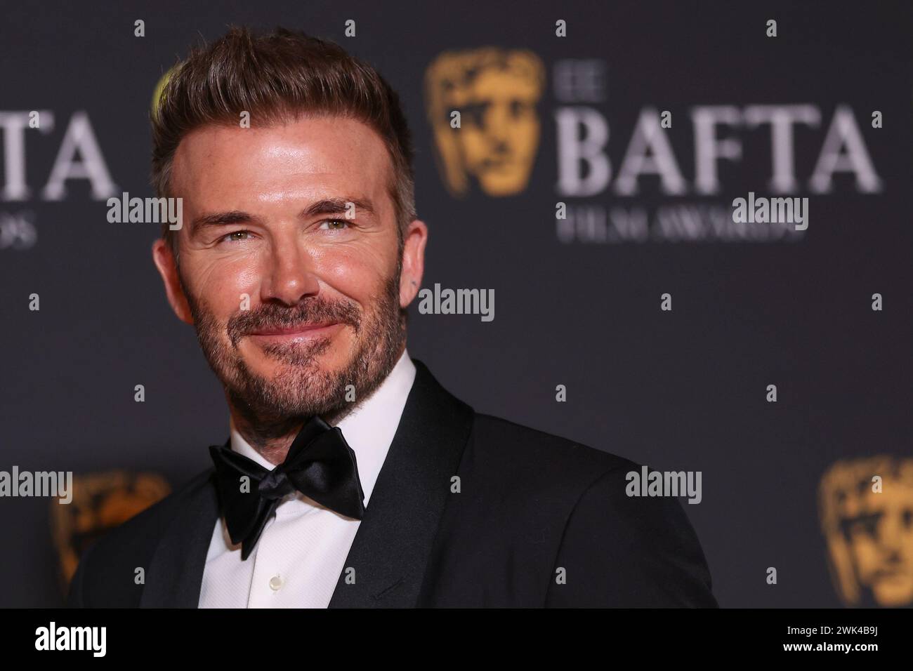David Beckham poses for photographers at the 77th British Academy Film ...