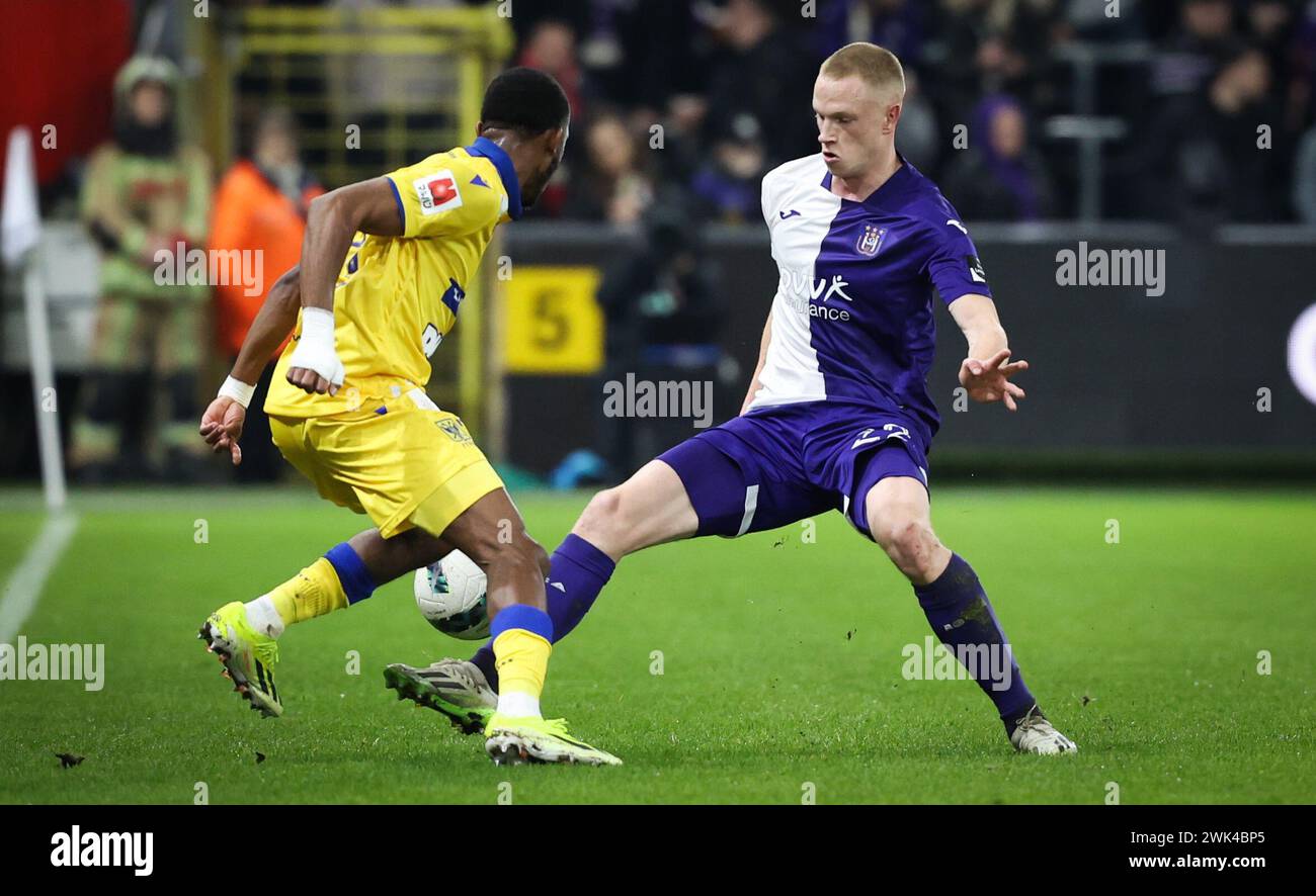 Brussels, Belgium. 18th Feb, 2024. STVV's Eric Junior Bocat and ...