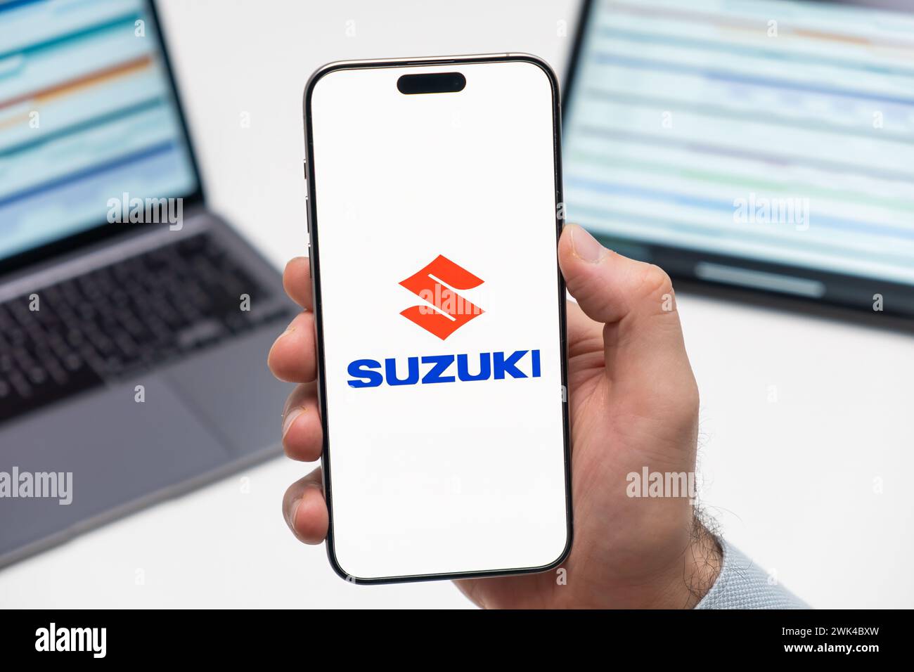 PRAGUE, CZECHIA - FEBRUARY, 2024: Suzuki automobile logo on the screen ...