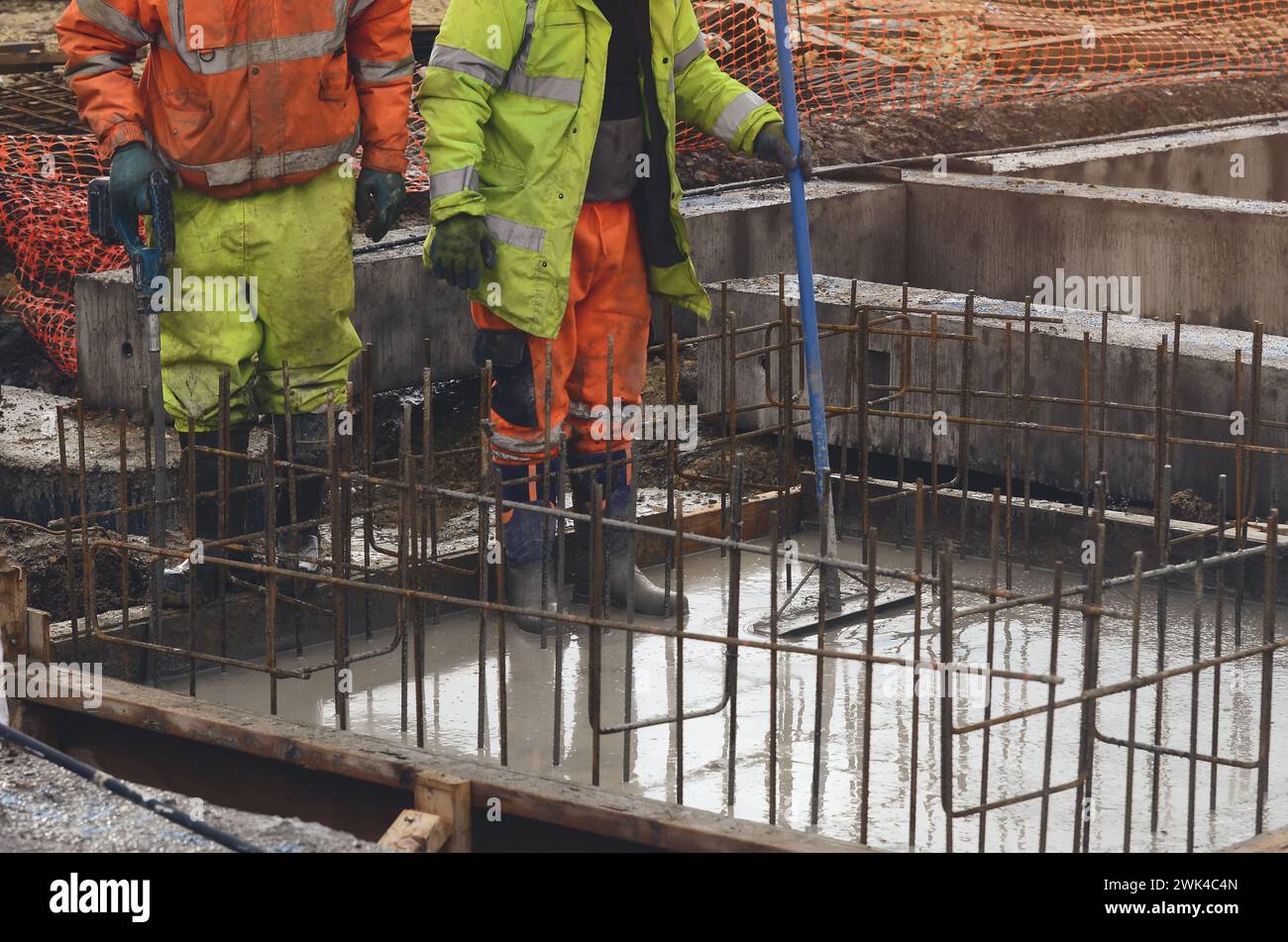 Concrete cast-in-place work. Builder level wet concrete. Concrete works ...