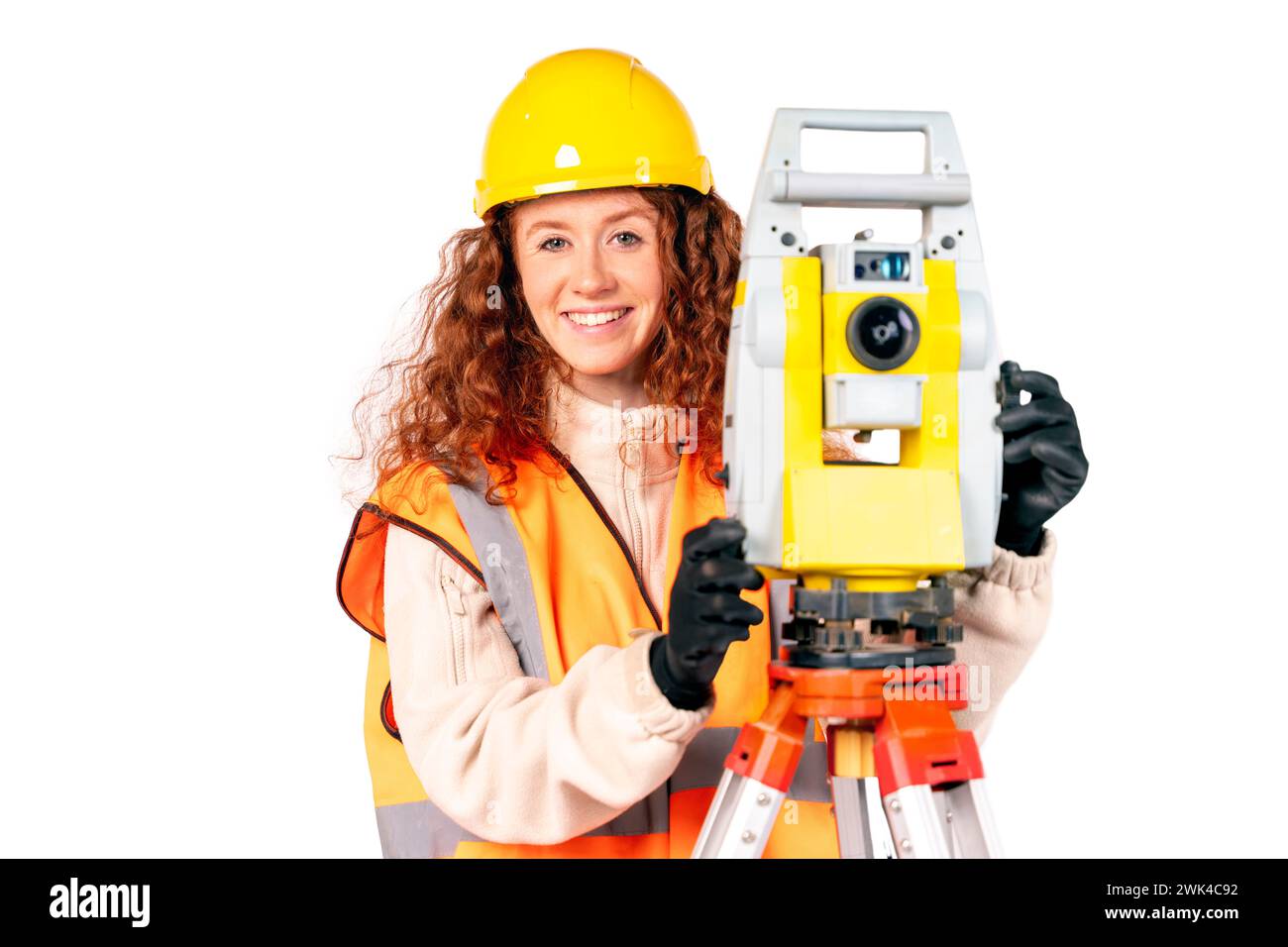 Construction site engineer woman in safety equipment working with ...